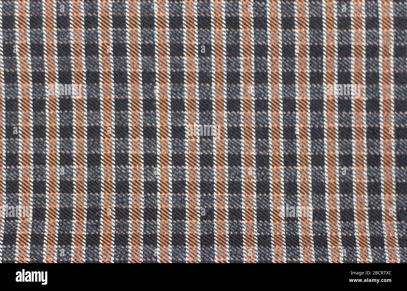 Background with a checkered pattern.Dark checkered fabric in black and ...
