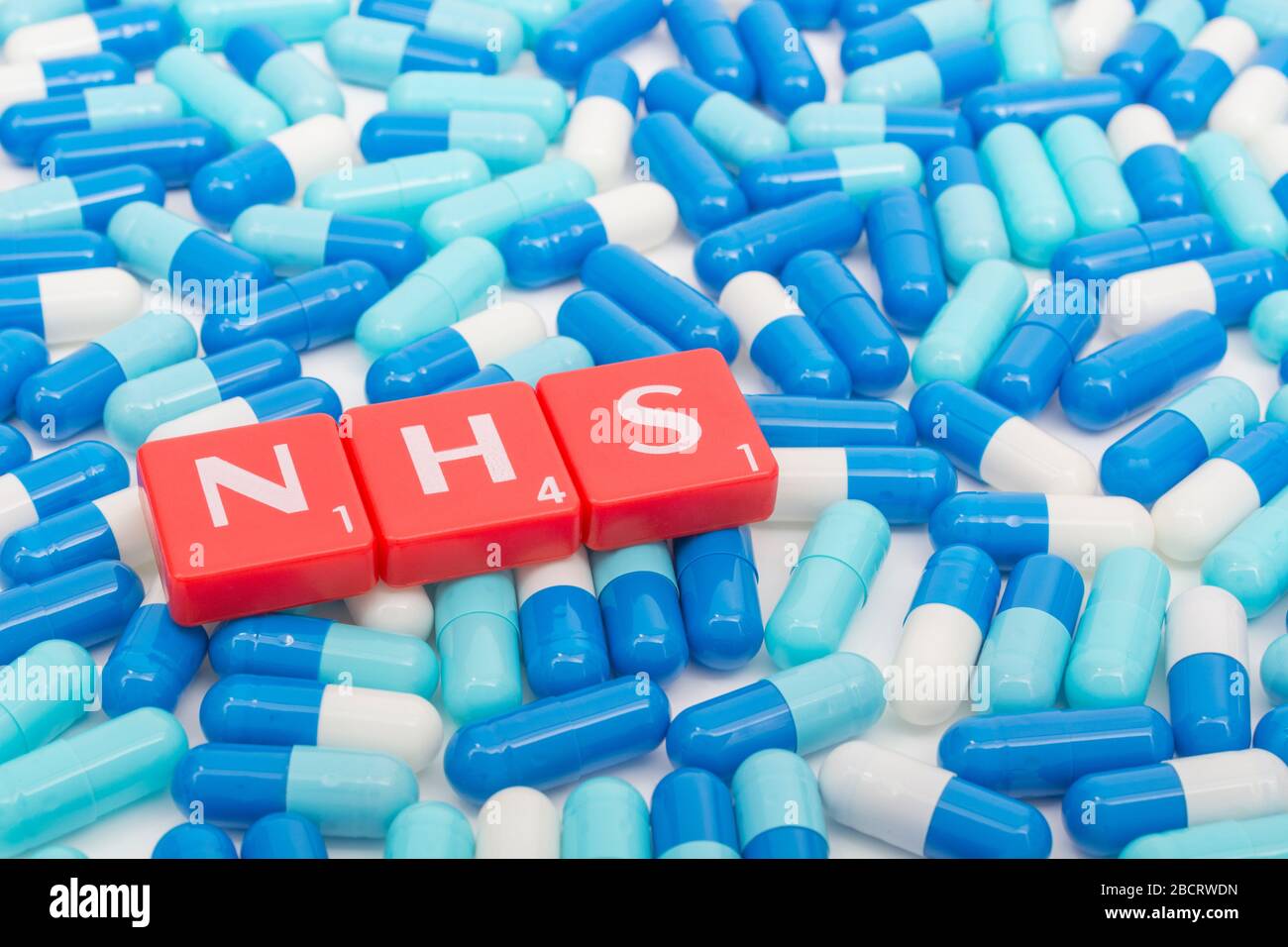 NHS letters tiles & assorted blue pills. For NHS 75th birthday, NHS ...