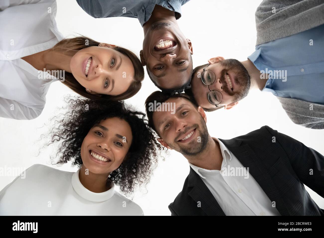 Multiethnic team business people faces looking at camera Stock Photo ...