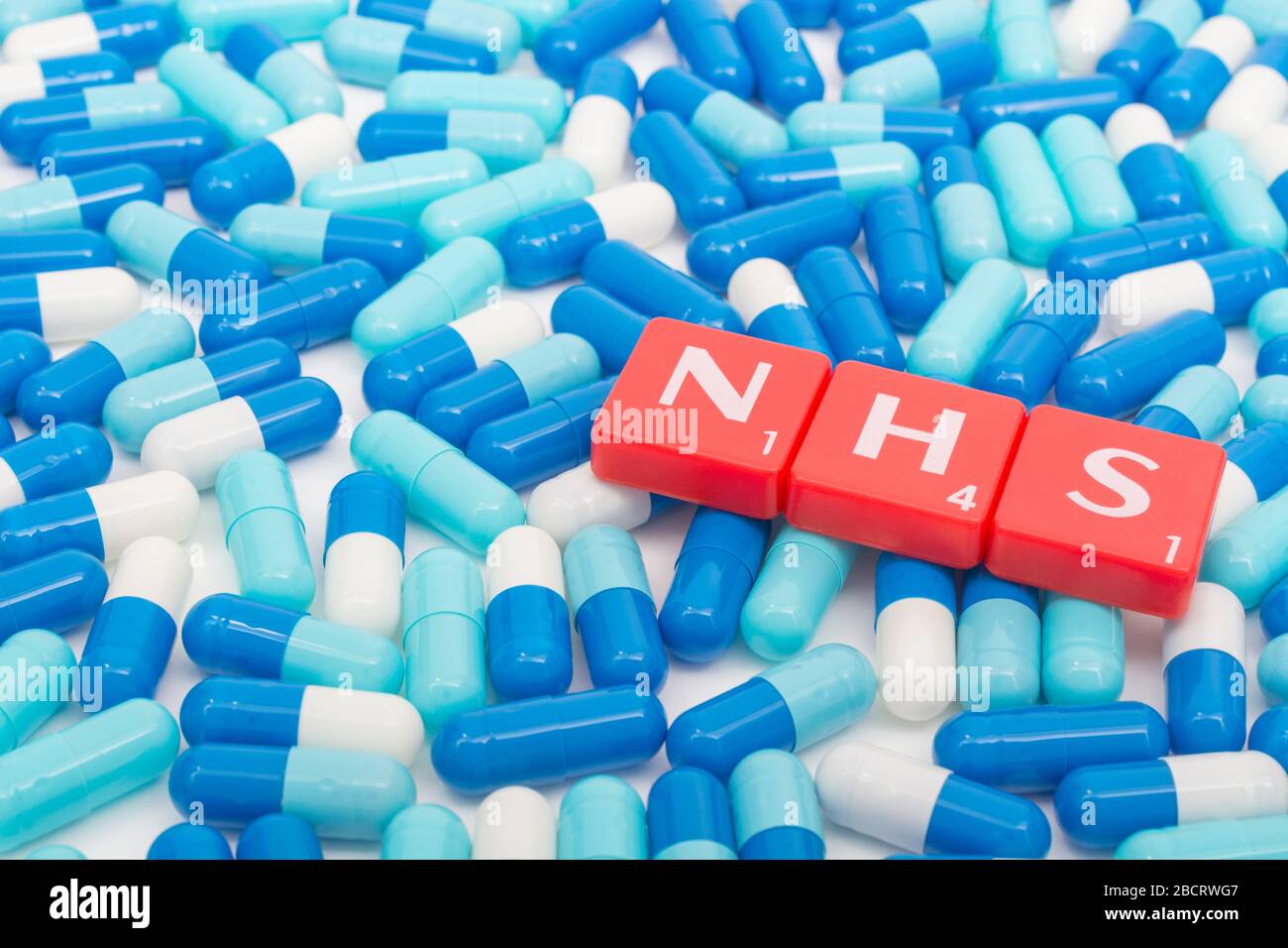 NHS letters tiles & assorted blue pills. For NHS 75th birthday, NHS ...