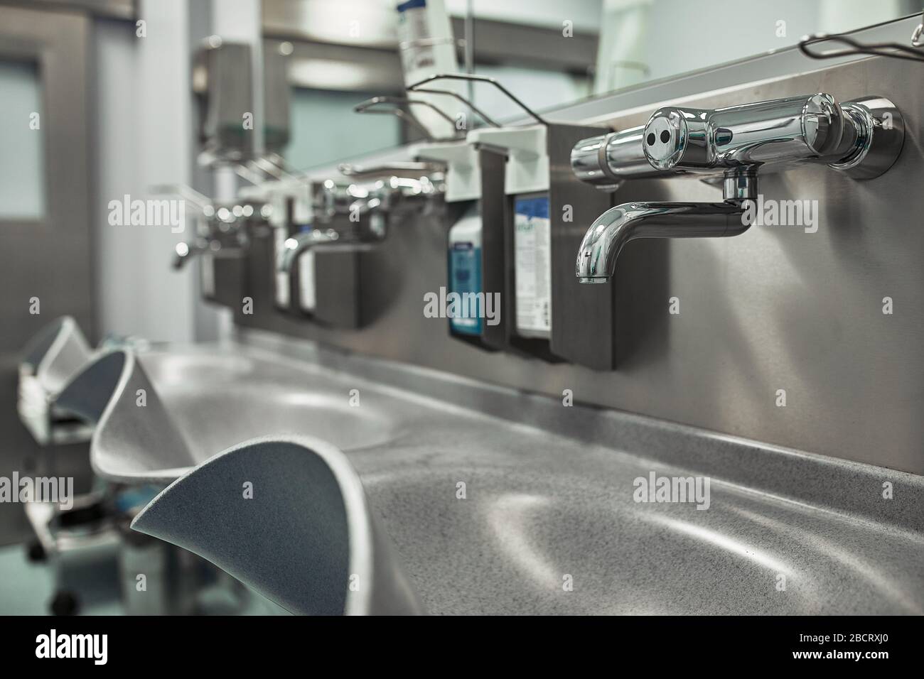 Hand wash room in the hospital. Modern preoperative room for ...