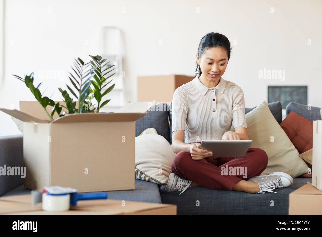 Laptop asian woman dorm hi-res stock photography and images - Alamy