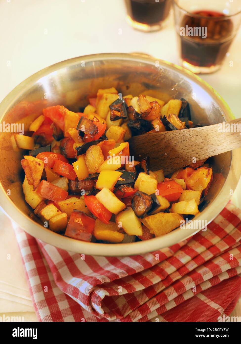Traditional calabrian recipe Ciambotta, potatoes, tomatoes, peppers and ...
