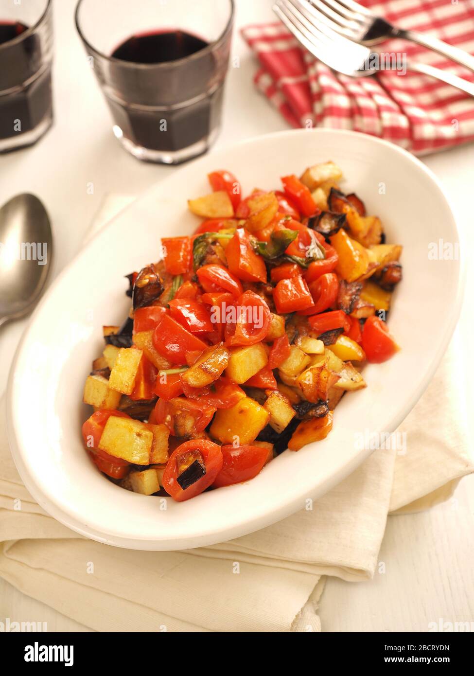 Traditional calabrian recipe Ciambotta, potatoes, tomatoes, peppers and ...