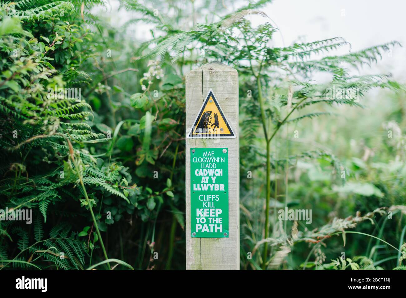Cliffs kill keep to the path tourist sign in welsh and english ...