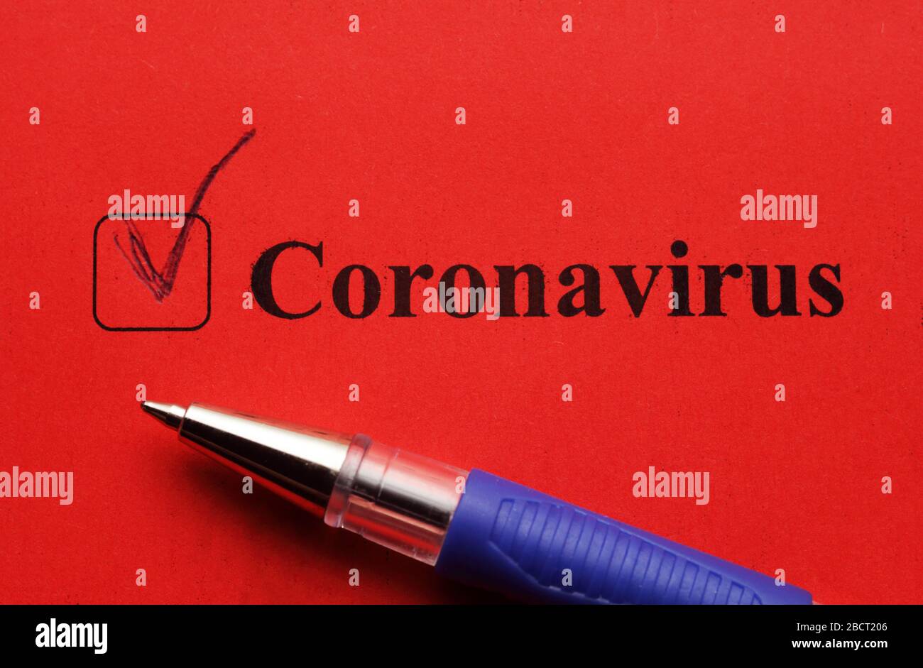 Coronavirus - checkbox with a tick on red paper with pen. Coronavirus ...