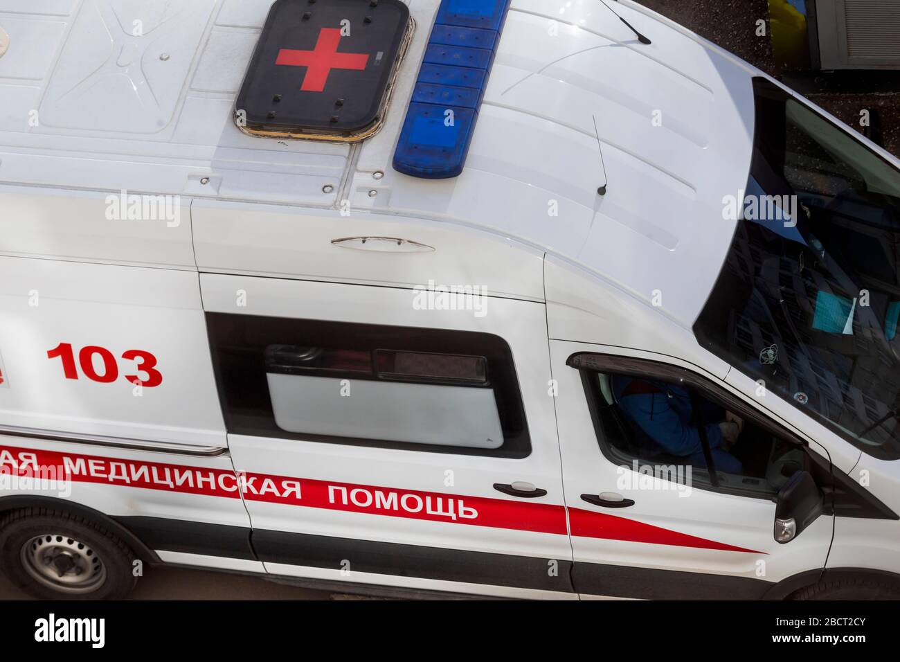 Top view of a car of an emergency ambulance service arrived on a call ...