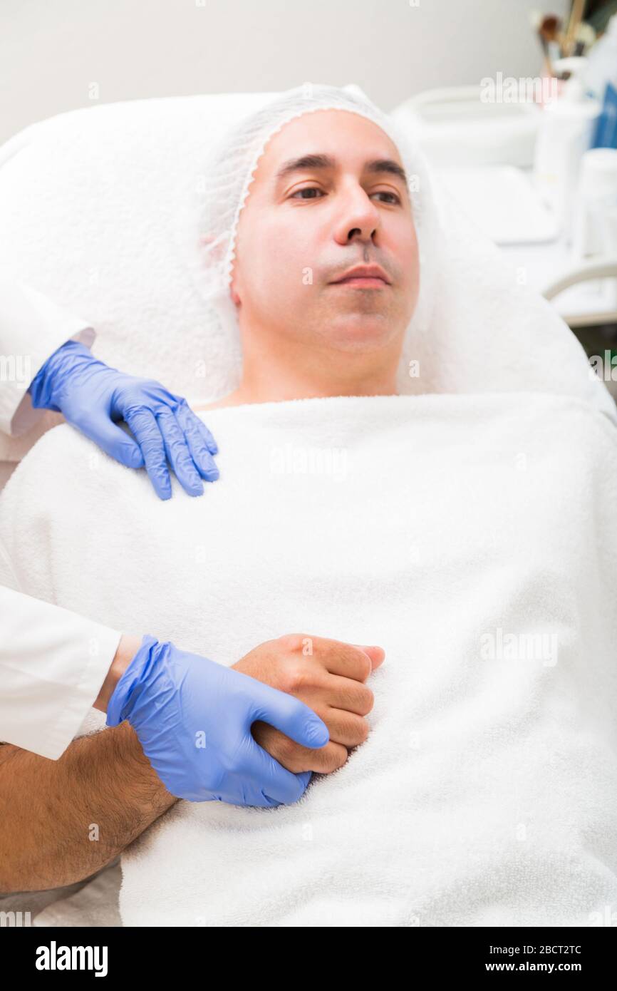 Lady squeezing her hands hi-res stock photography and images - Alamy