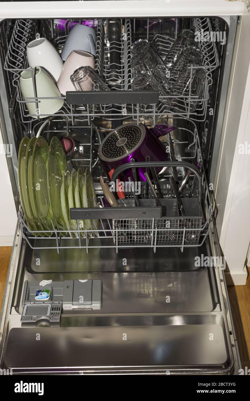 Close up view of open dishwasher. Technology background Stock Photo - Alamy