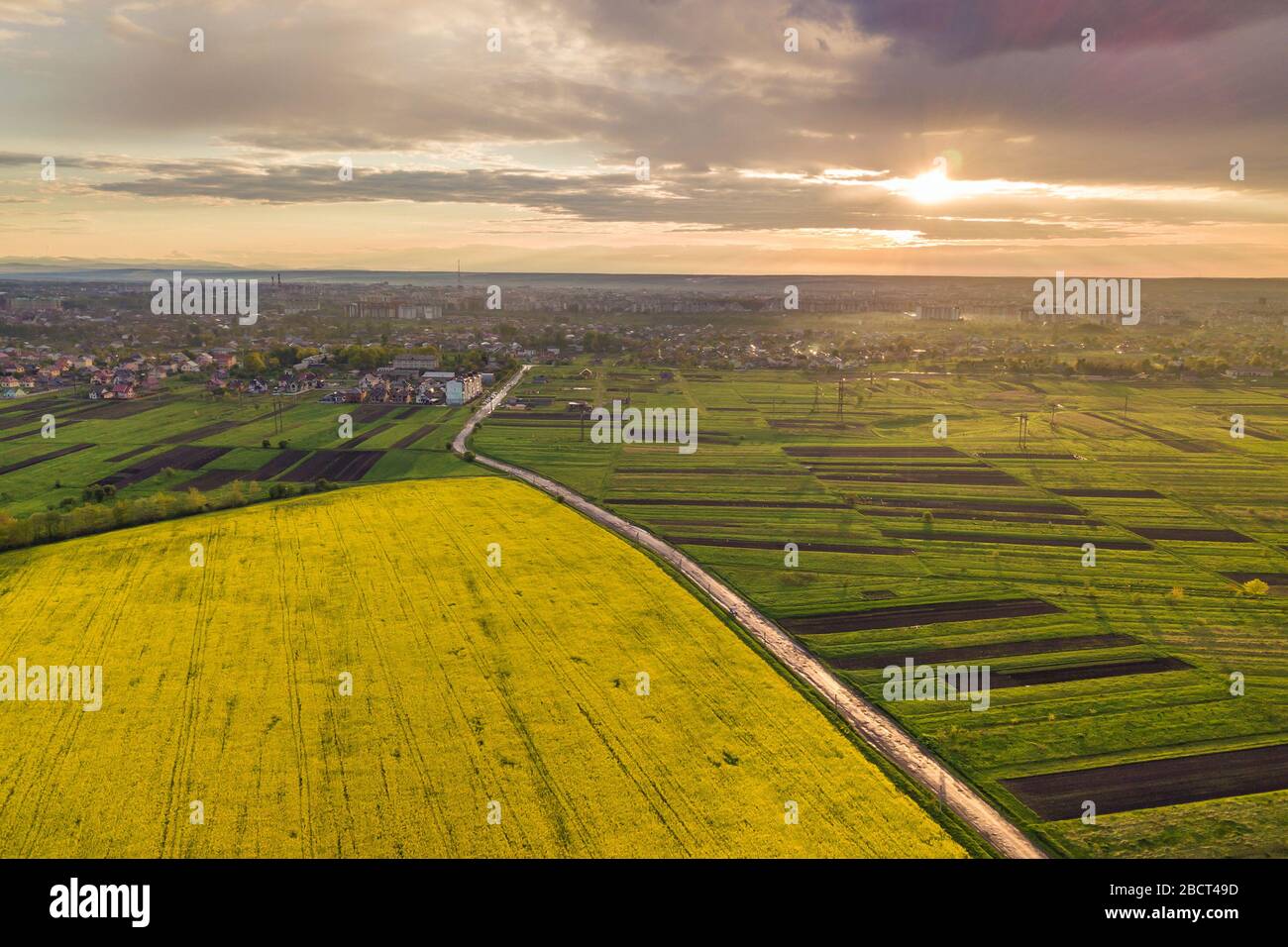 Rural landscape on spring or summer day. Aerial view of green, plowed ...