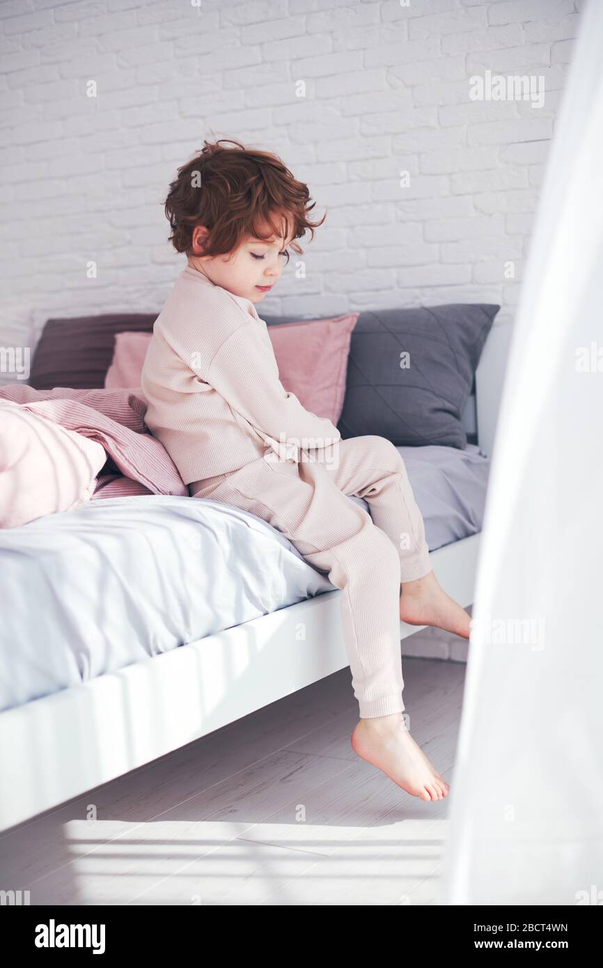 Child getting up in the morning hi-res stock photography and images - Alamy