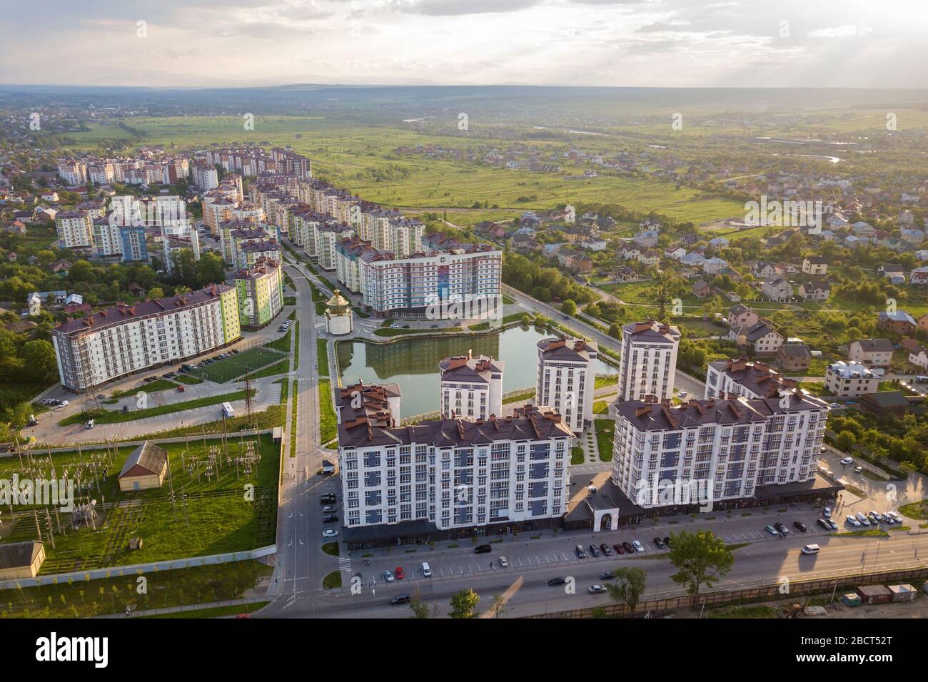Top view of urban developing city landscape with tall apartment ...