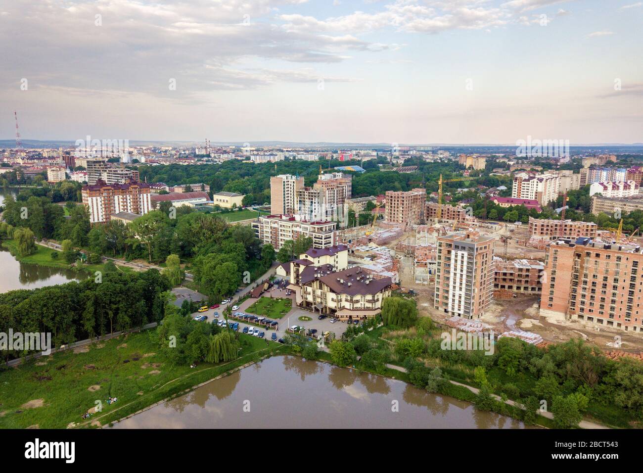 Top view of urban developing city landscape with tall apartment ...