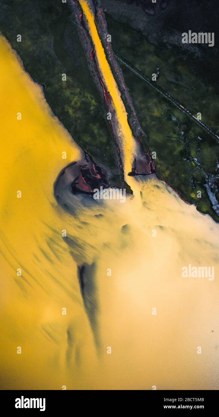 Drone perspective of Yellow Glacier Lake in Iceland with a brown ...