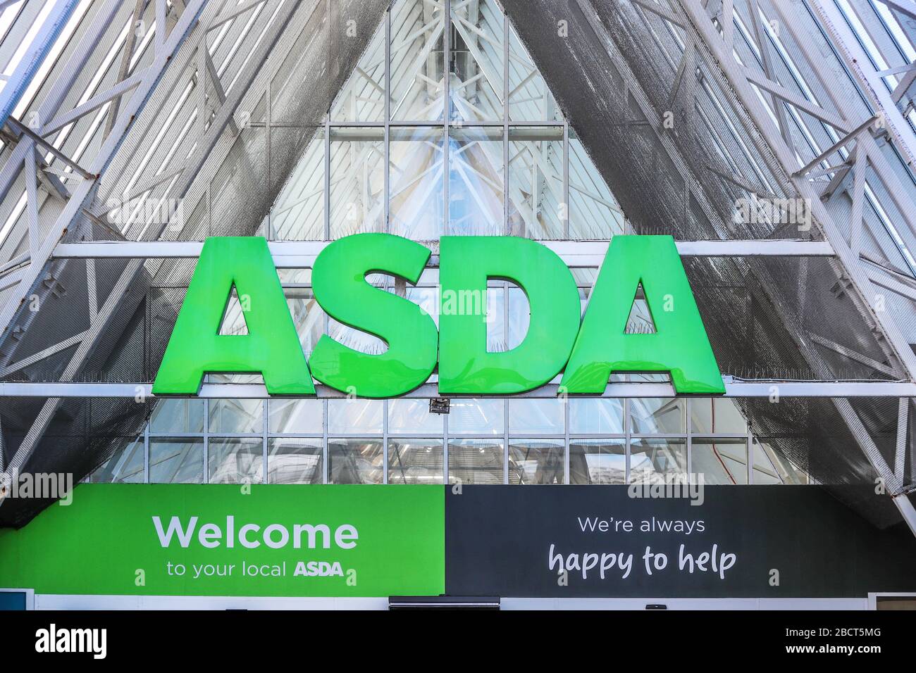 Asda supermarket logo with sign , Irvine, Ayrshire, UK Stock Photo - Alamy