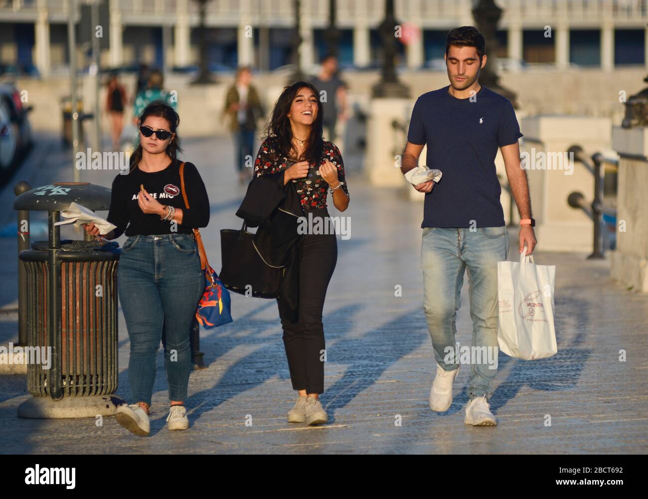 Italian friends walking in Lungomare Imperatore Augusto. Bari, Italy ...