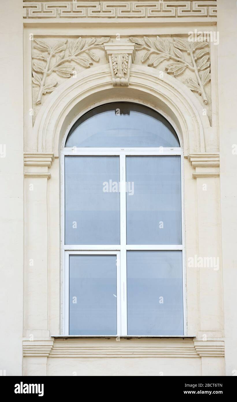 Close-up decorative window framing of old historic building, former ...