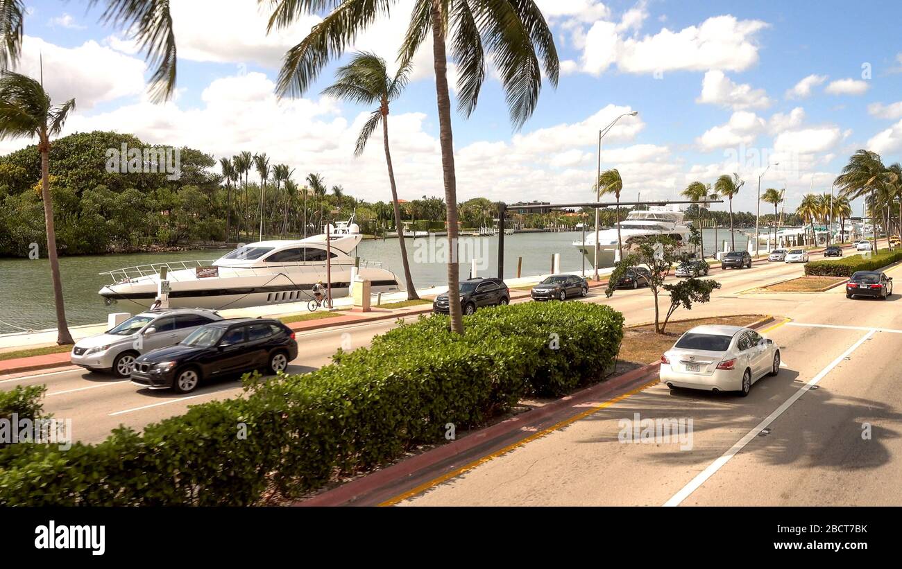 Typical Street views with canals and yachts in Miami Beach - MIAMI, USA ...