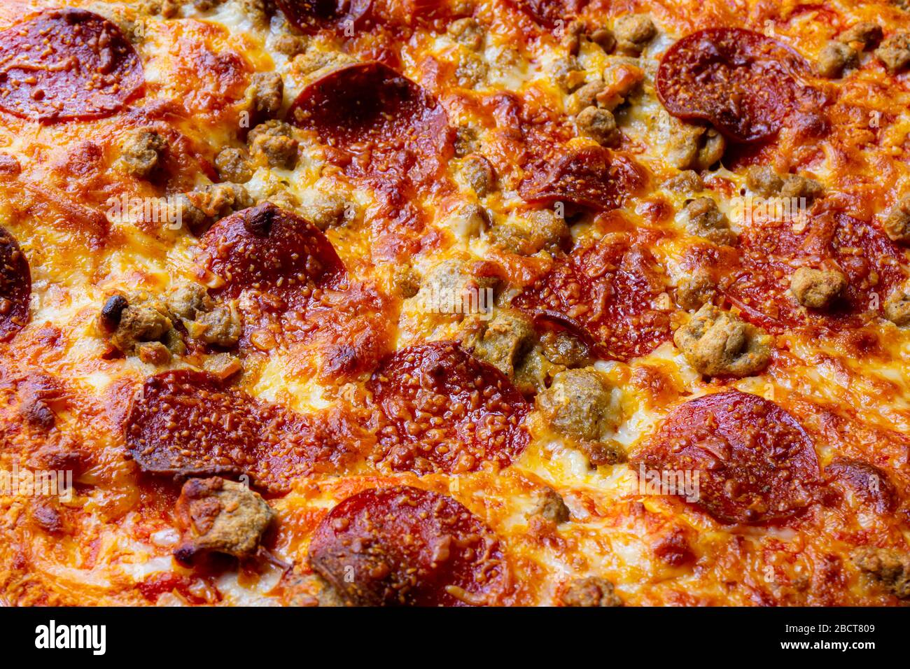 closeup of three meat cheese pizza Stock Photo - Alamy