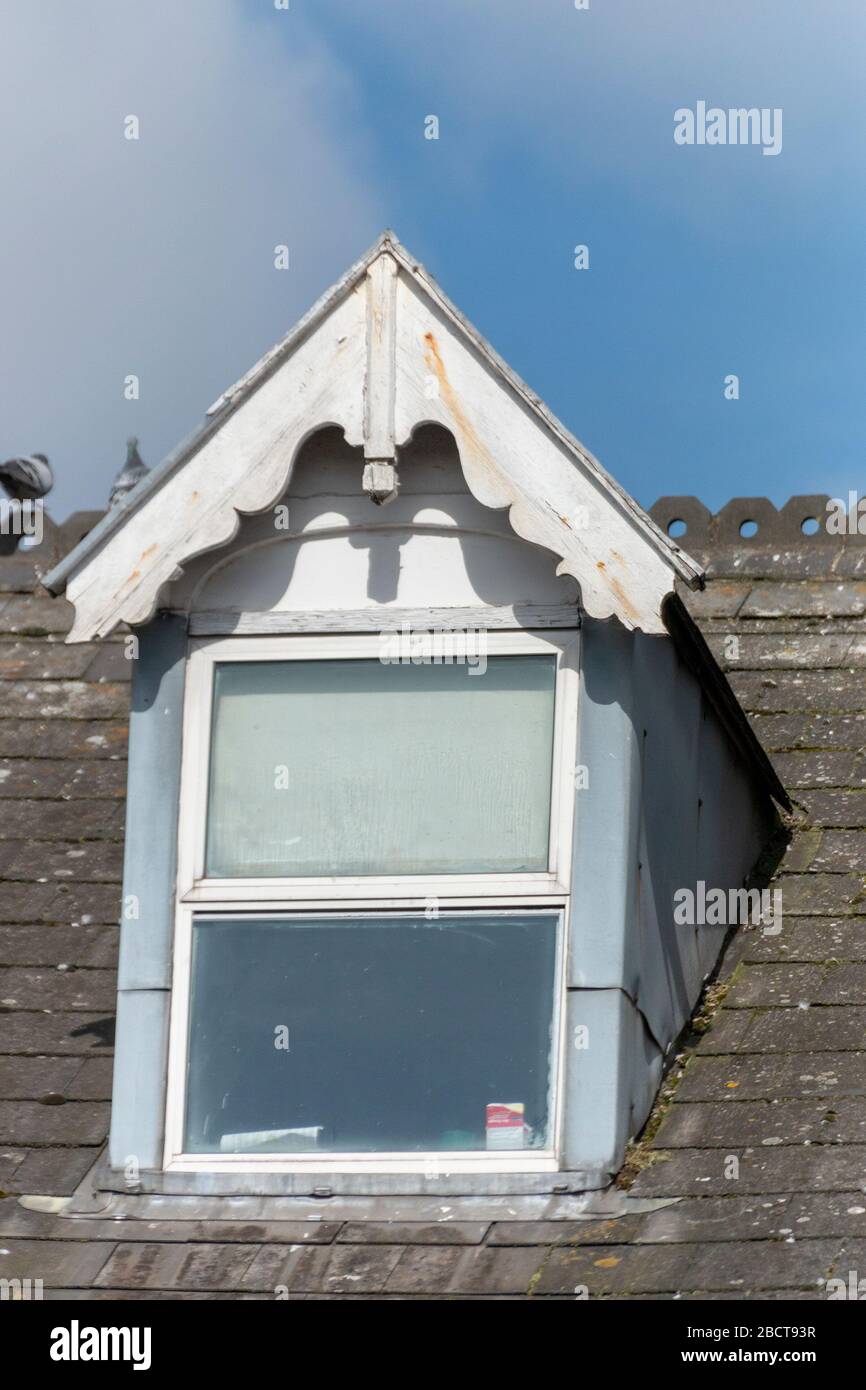 a close up view of a small window on the top of a roof area Stock Photo ...