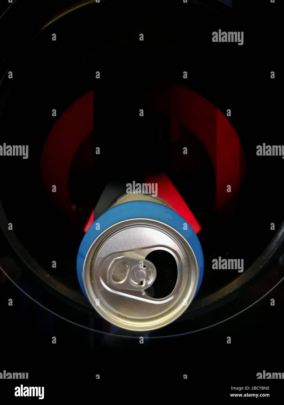 Close up of alcoholic drink can in automatic reverse vending machine ...