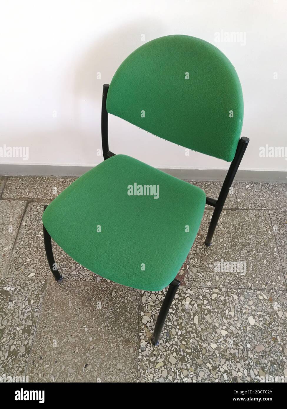 Modern green fabric office chair on the stone pattern taled floor Stock ...