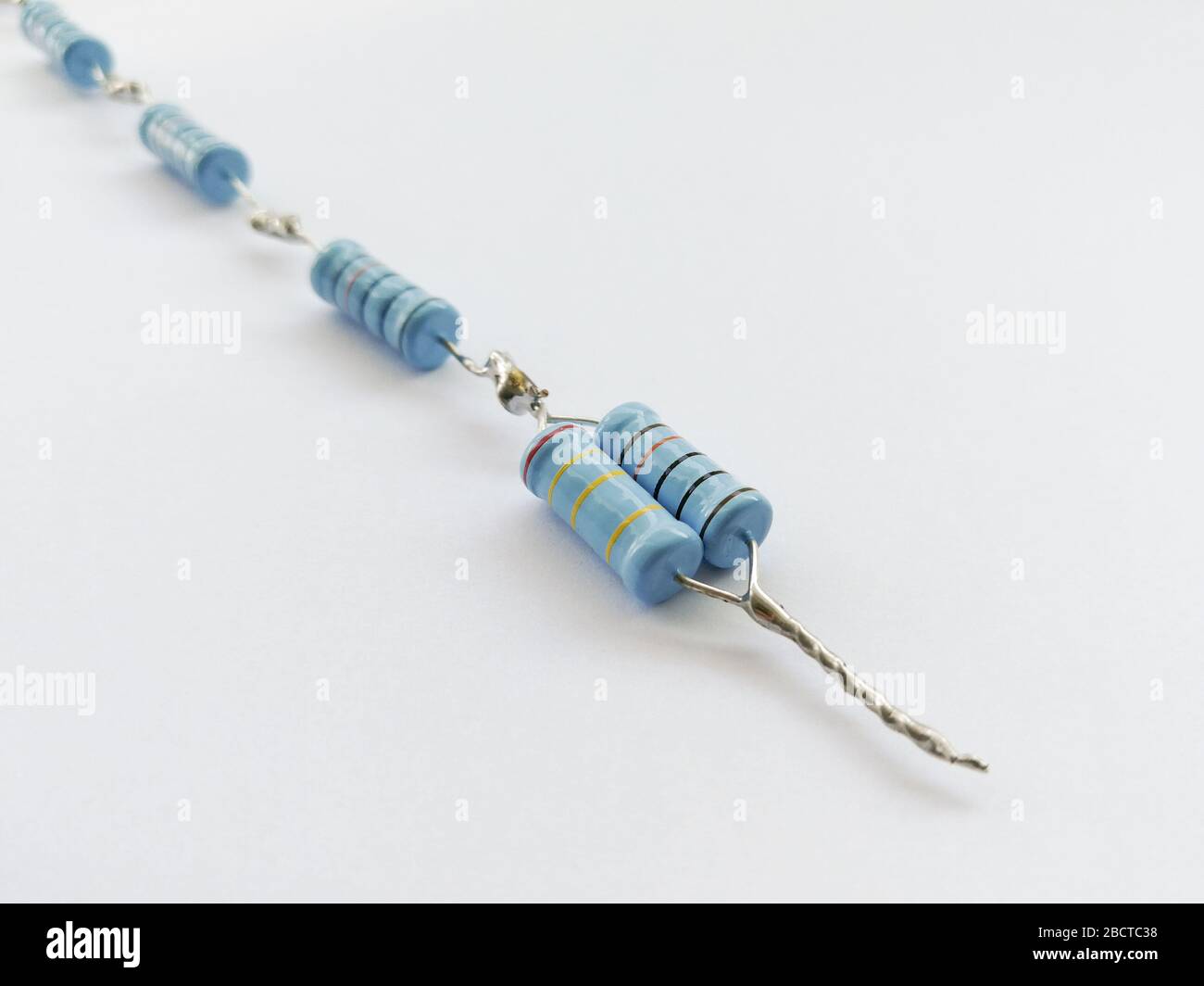 Various axial through hole technology resistors connected in series and ...