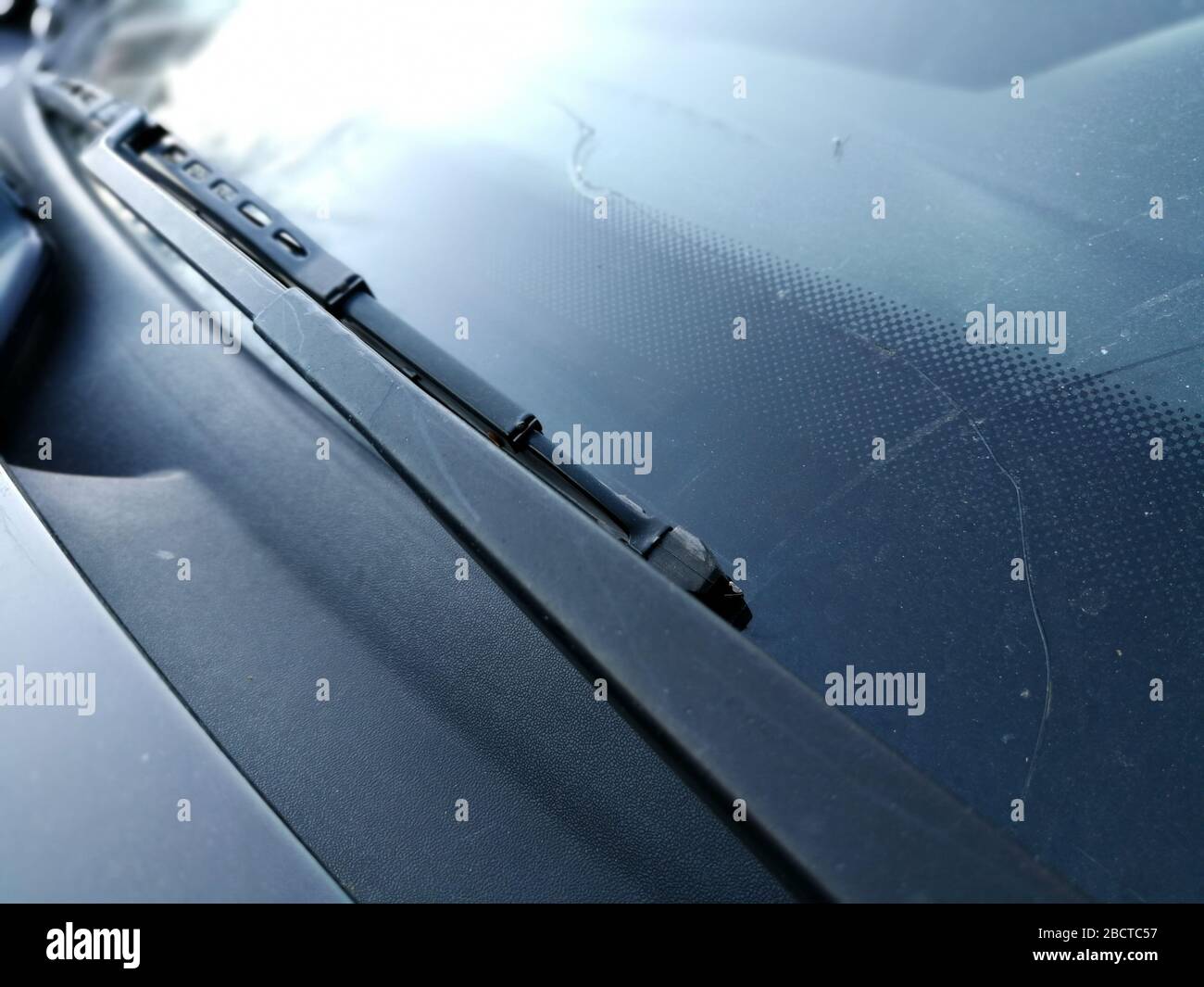 Windscreen glass crack in vehicle front glass close up Stock Photo - Alamy