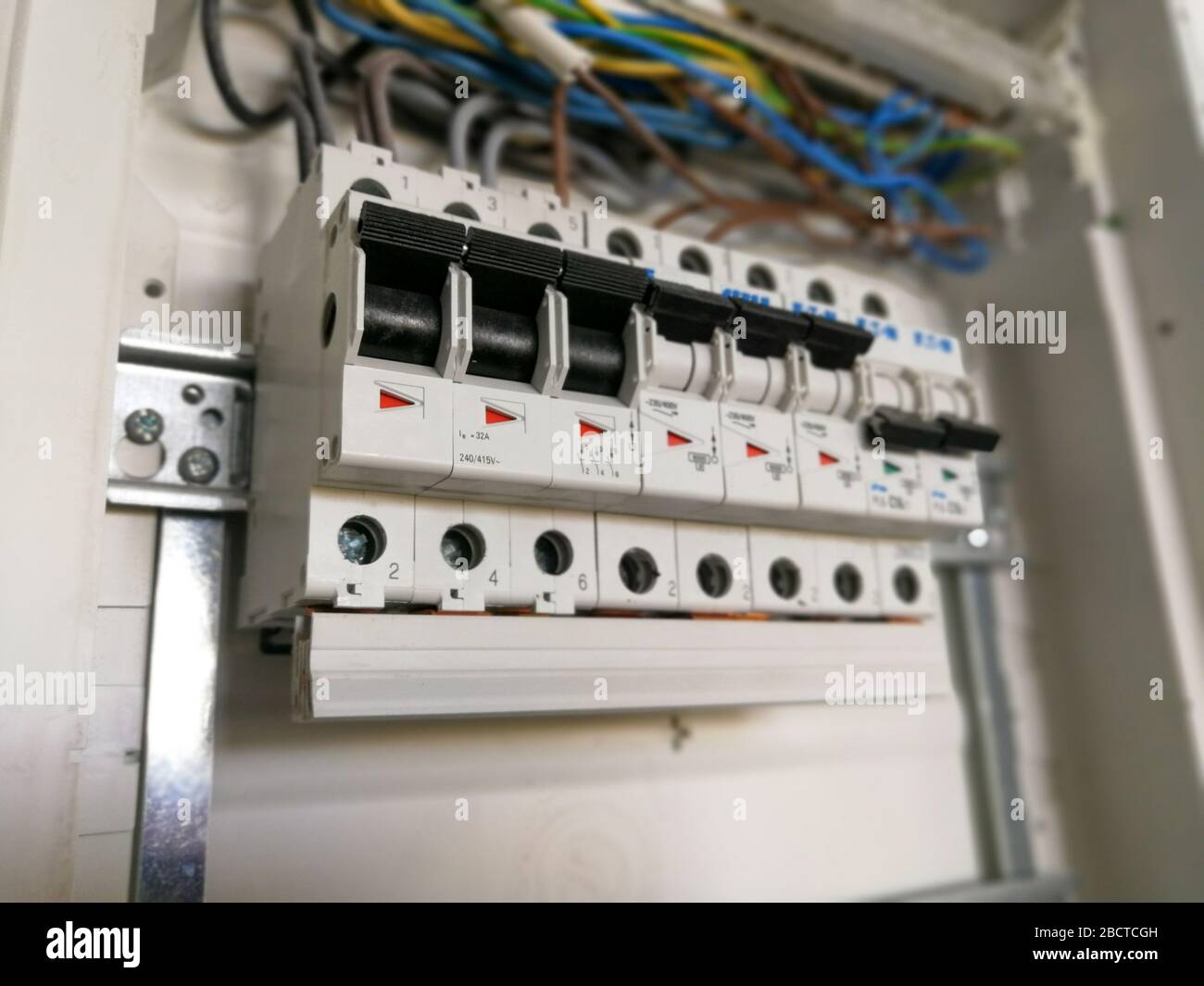 Electric safety switches and wiring inside electrical panel Stock Photo ...