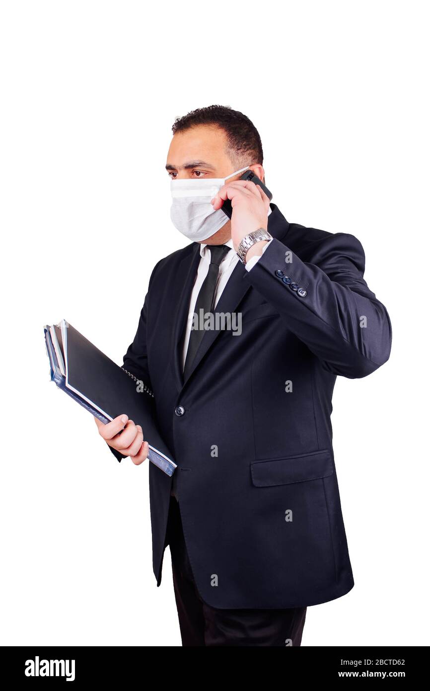 Businessman in formal wear and medical mask working from home. Boss ...
