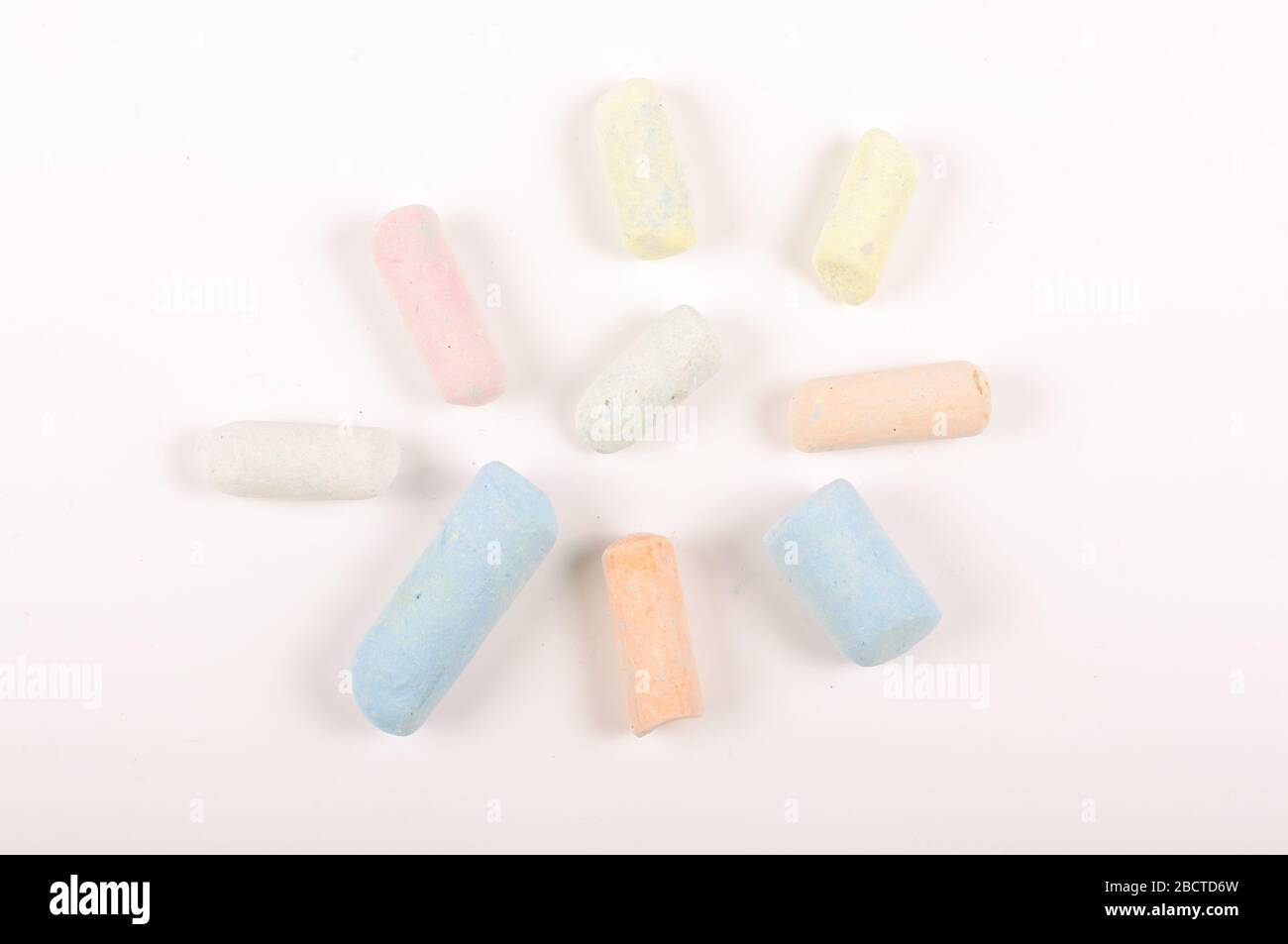 Variety of chalks on the bright background. Old tool for drawing Stock ...
