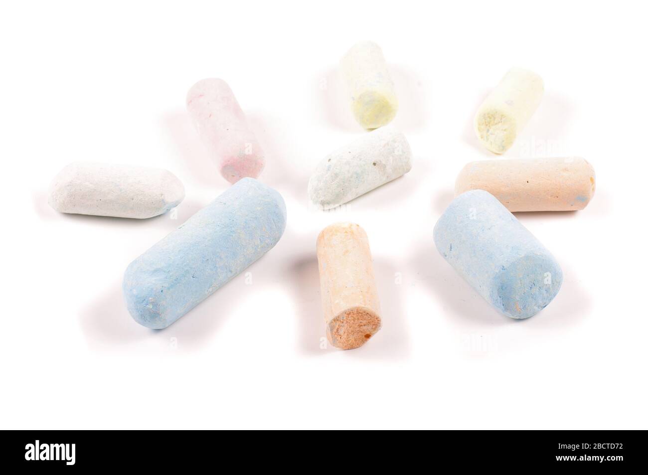 Variety of chalks on the bright background. Old tool for drawing Stock ...