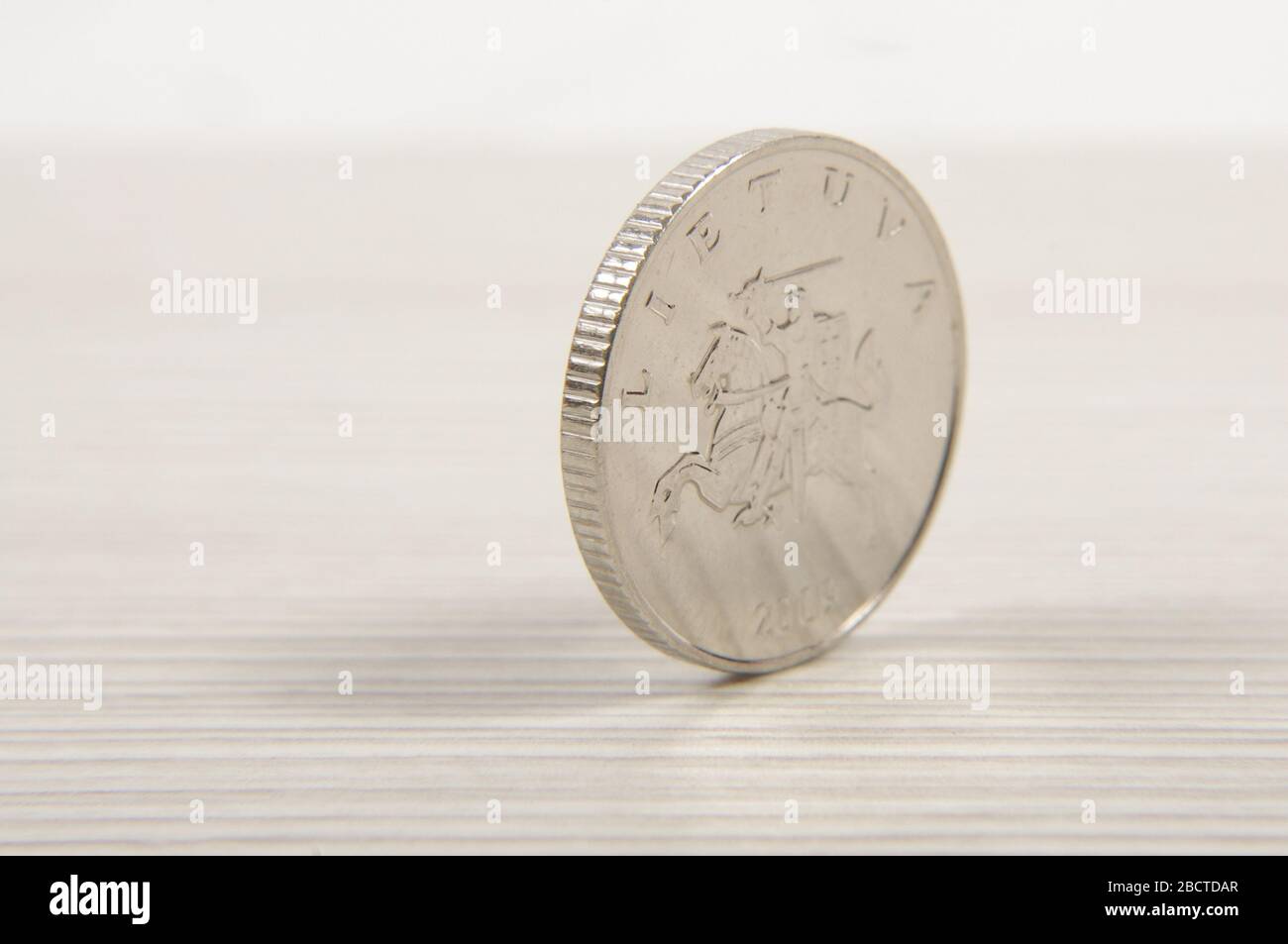 Historical Lithuanian coin of one litas standing on the rim Stock Photo ...