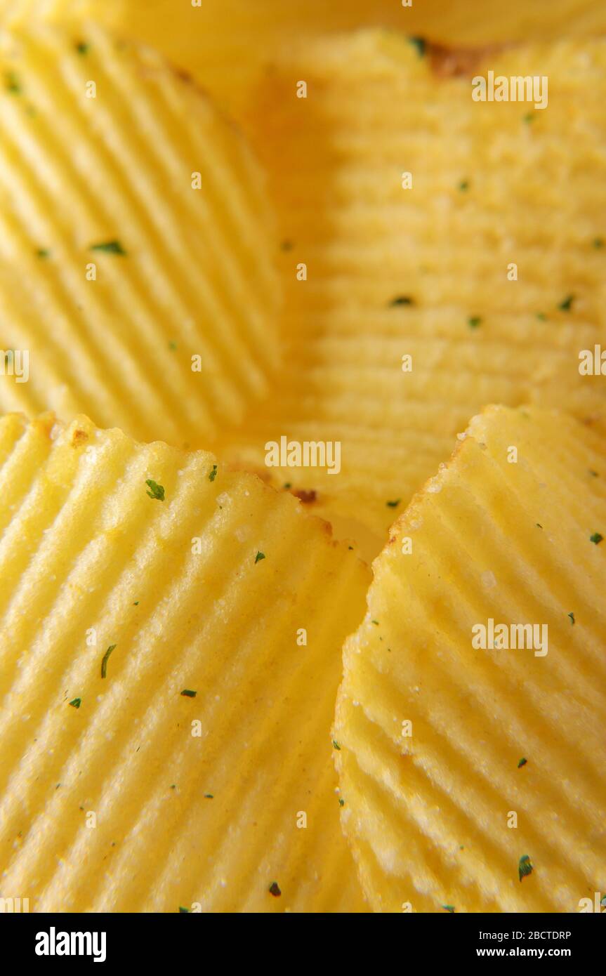 Wavy potato chips abstract texture pattern macro close up Stock Photo ...