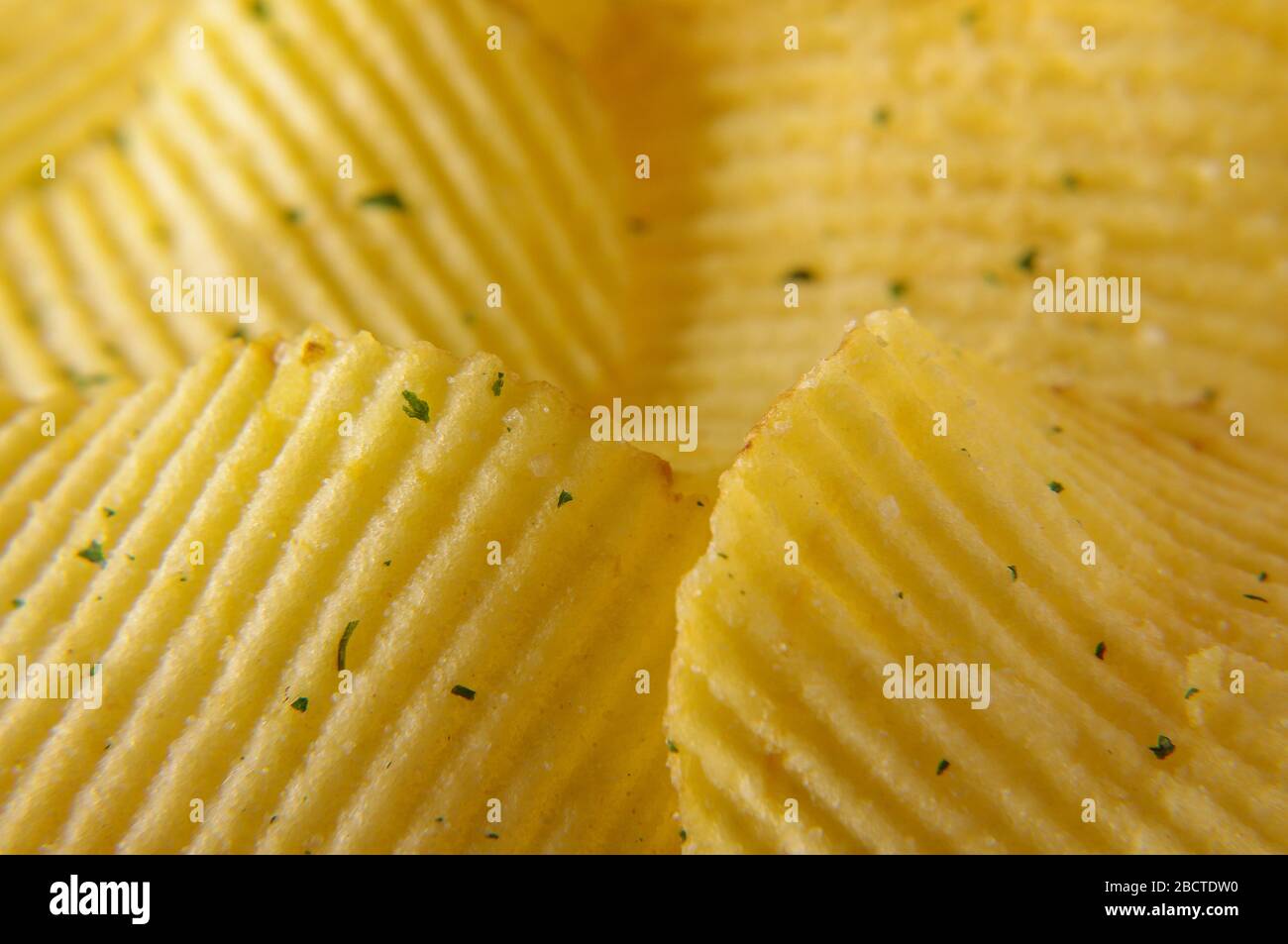 Wavy potato chips abstract texture pattern macro close up Stock Photo ...