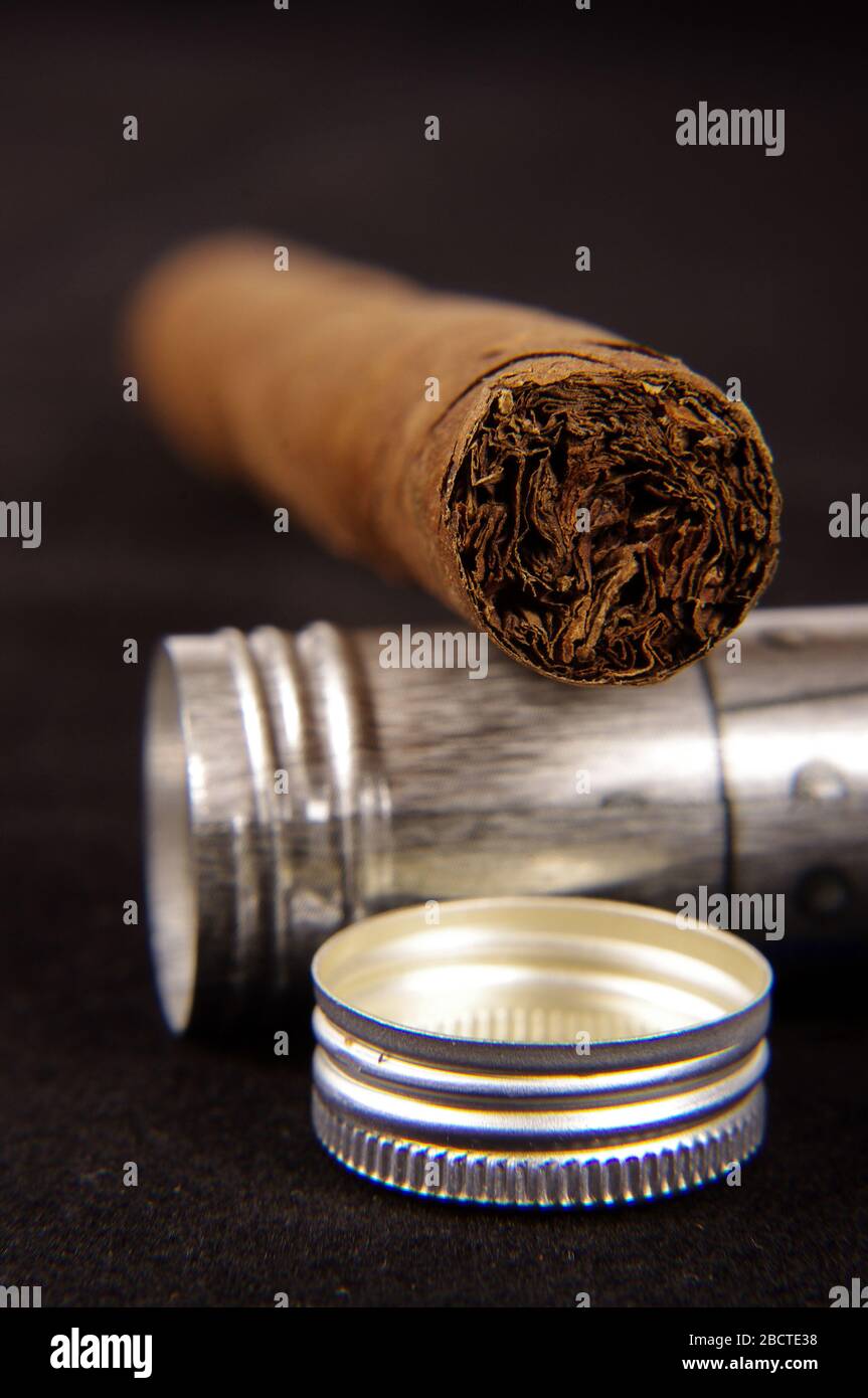 The photo in which macro closeup of cigar isolated on the black ...