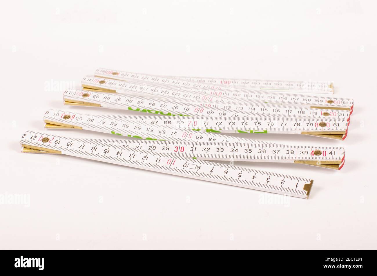 White carpenter's ruler isolated on the white background Stock Photo ...