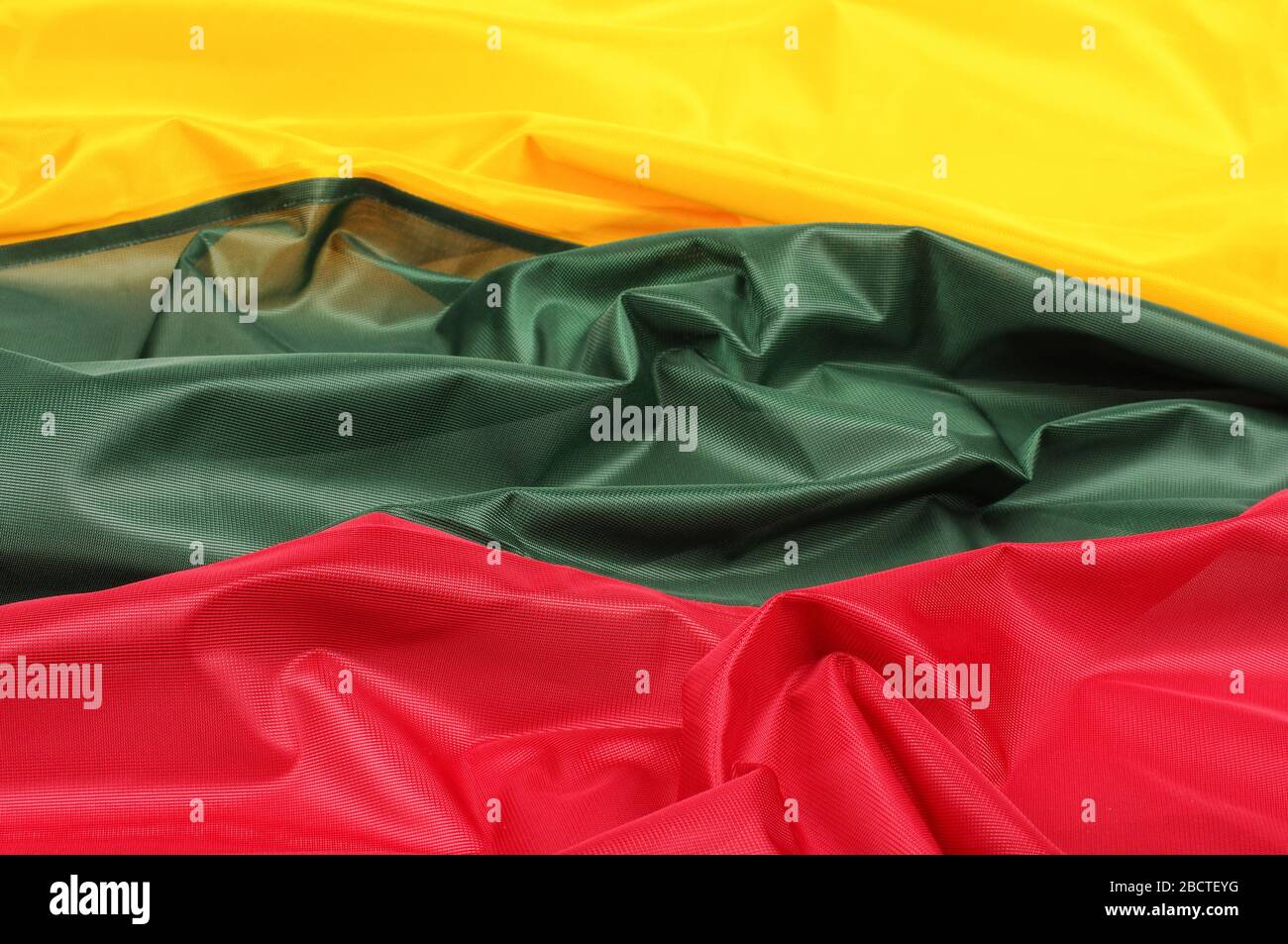 The flag of Lithuania: green, yellow, red Stock Photo - Alamy