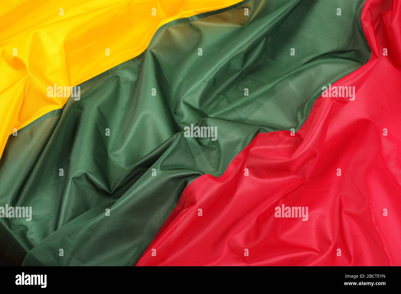 The flag of Lithuania: green, yellow, red Stock Photo - Alamy