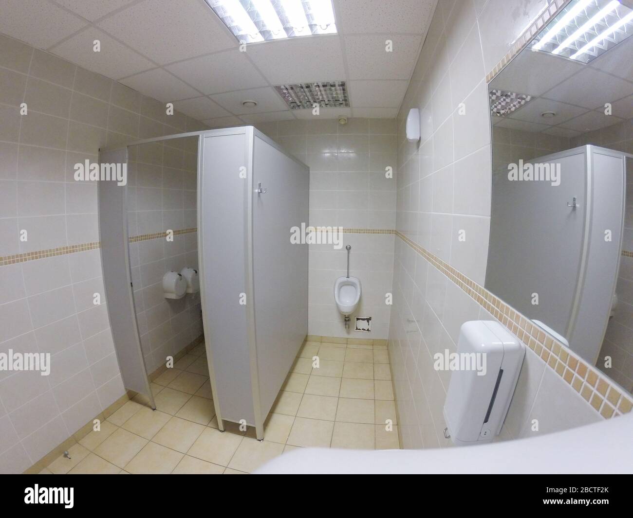 Empty modern office restroom interrior Stock Photo - Alamy