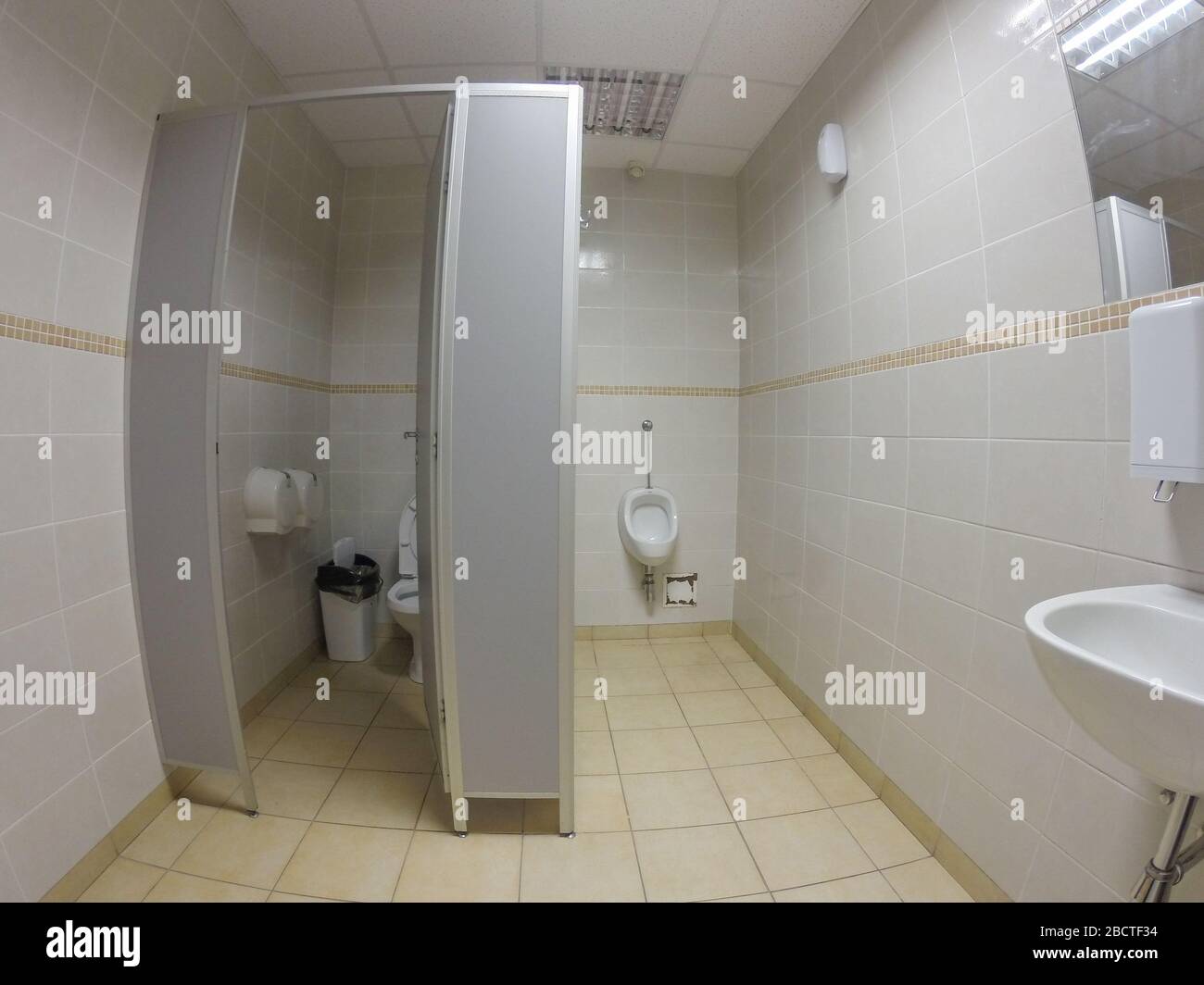 Empty modern office restroom interrior Stock Photo - Alamy