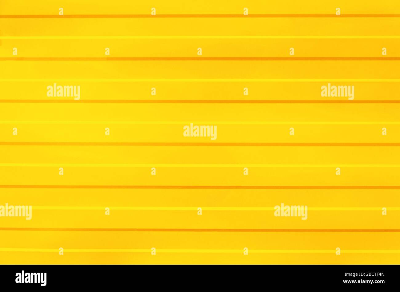 yellow background. yellow metal building panel. texture of a metal wall ...