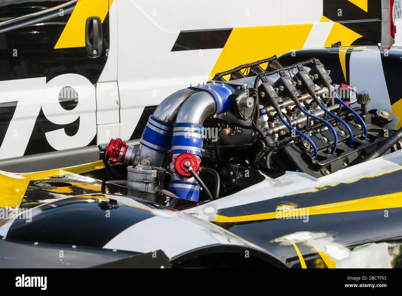 engine of a powerful racing car. dragster. race car concept. the car is ...