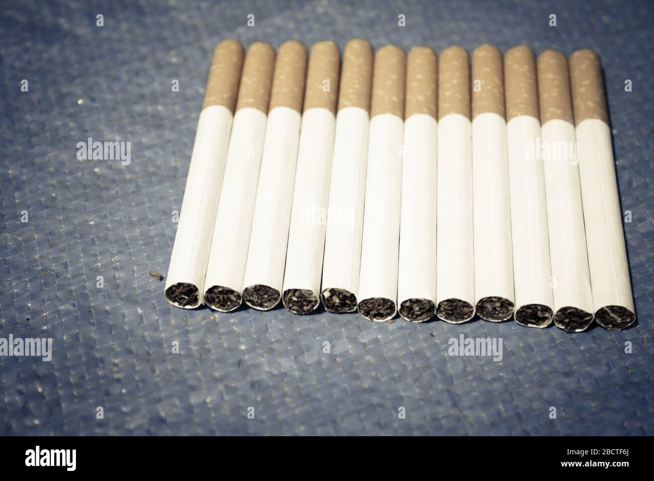 Cigarettes in a row hi-res stock photography and images - Alamy
