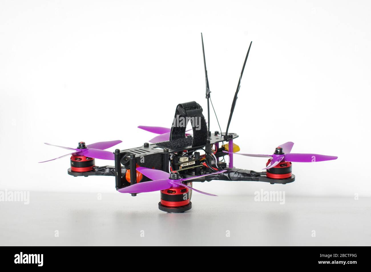 Small size racing drones isolated on the white background Stock Photo ...