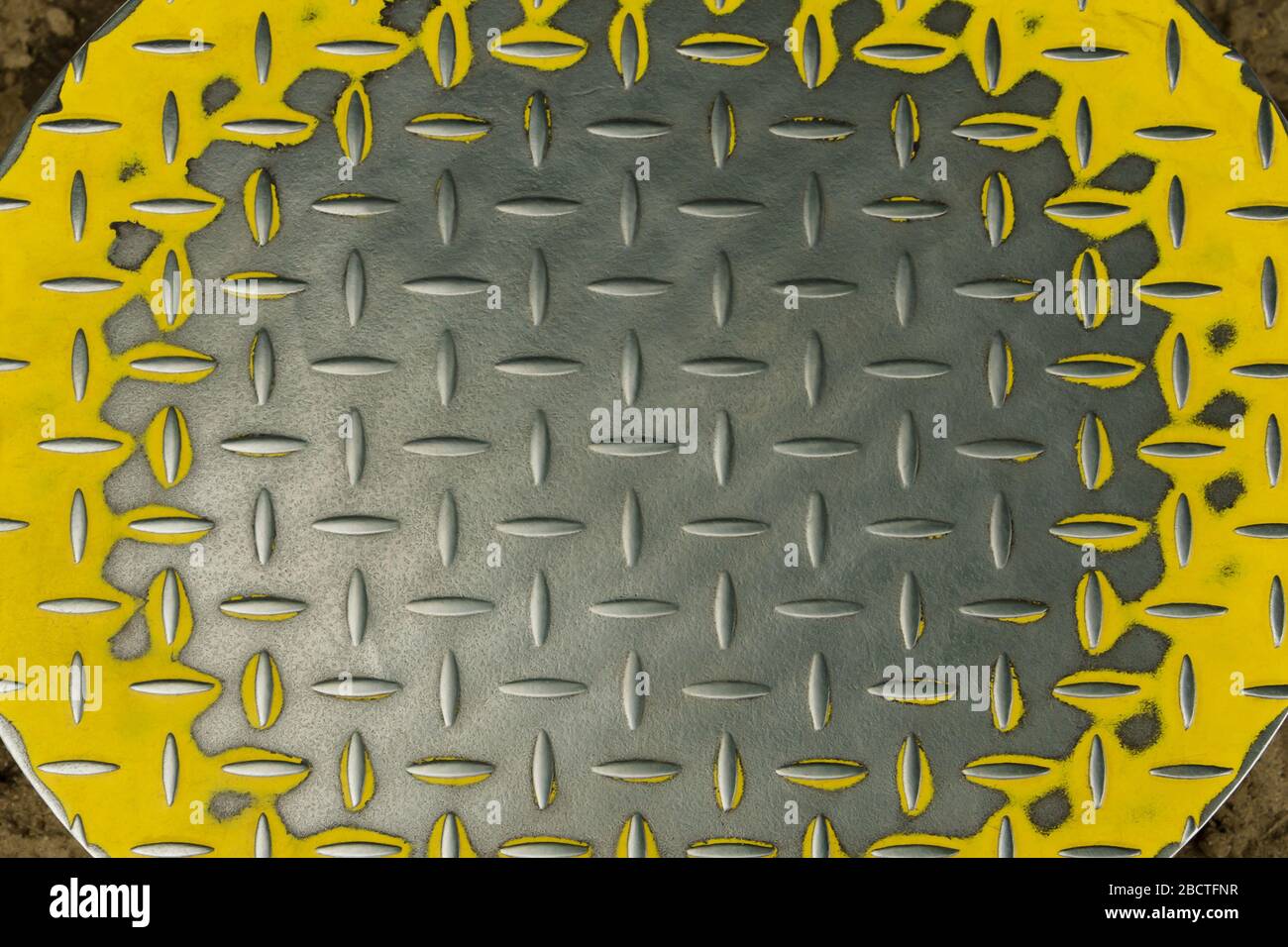 metal grooved plate with yellow trim Stock Photo - Alamy