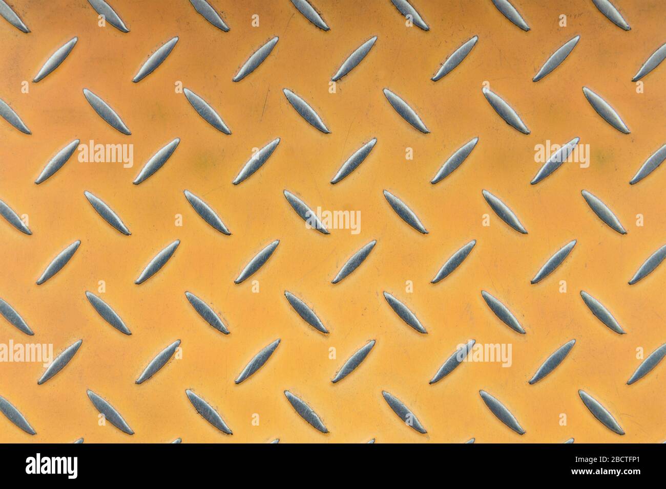 steel sheet metal plate with embossed diamond pattern with orange paint ...