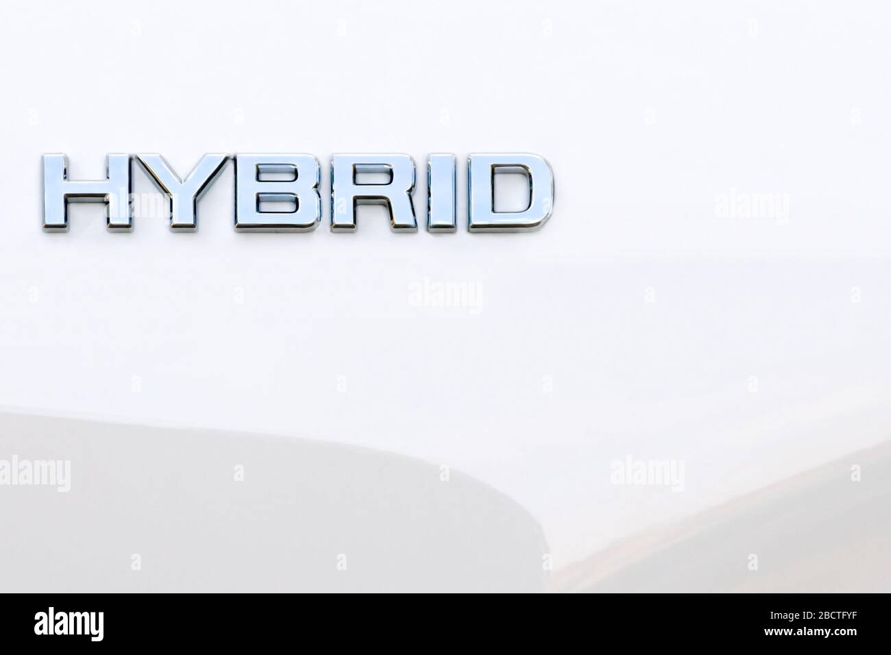 Closeup of Hybrid logo from hybrid car Stock Photo - Alamy