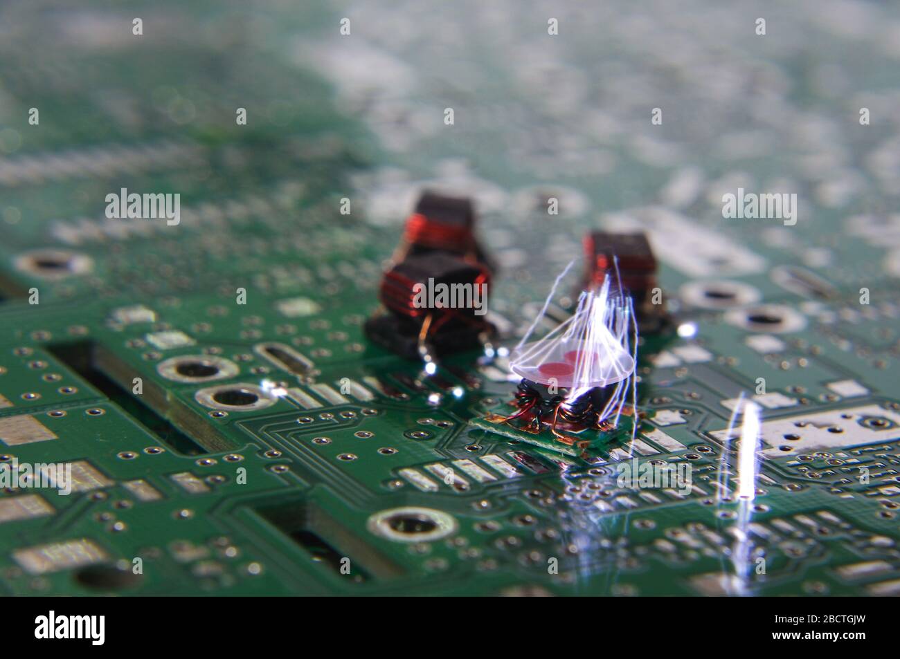 Small electrostatic lighting sparks closed to electronic components ...
