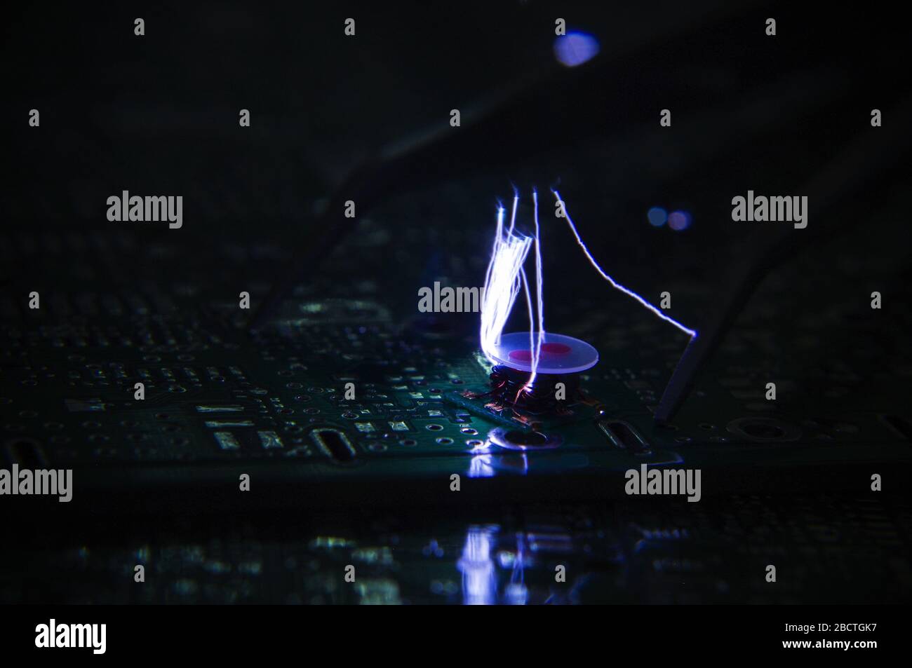 Small electrostatic lighting sparks closed to electronic components ...